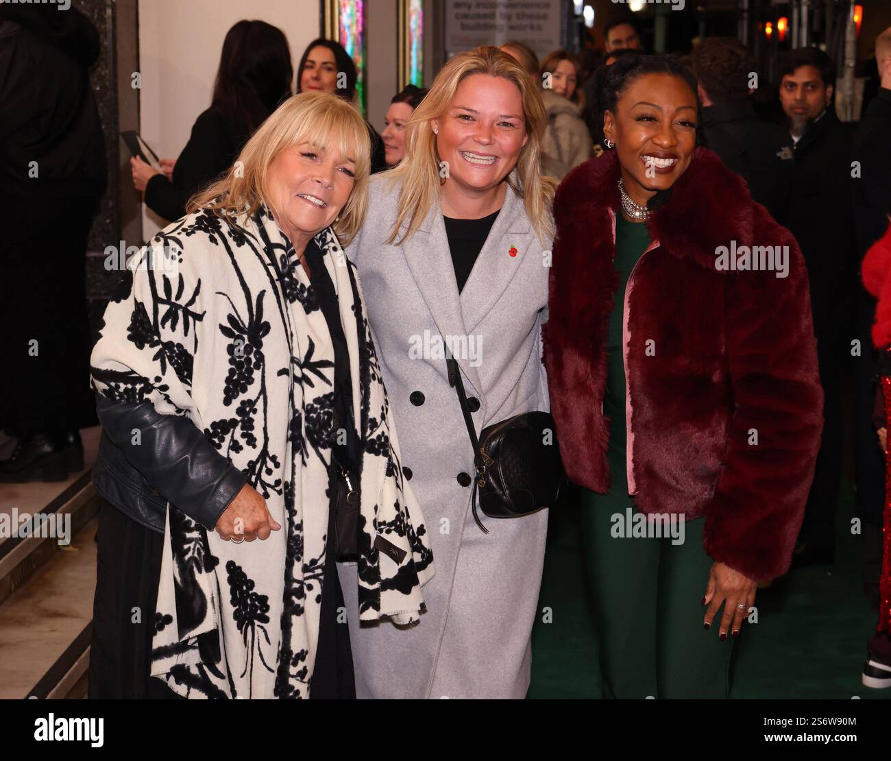 London, UK. Linda Robson, Lauren Amy and Beverley Knight at a Christmas ...