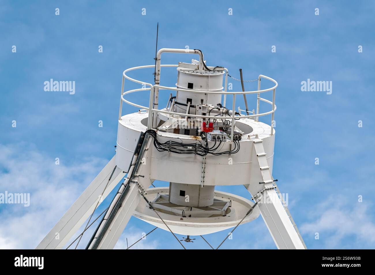 The detail of the subreflector assembly on the parabolic dish of a ...