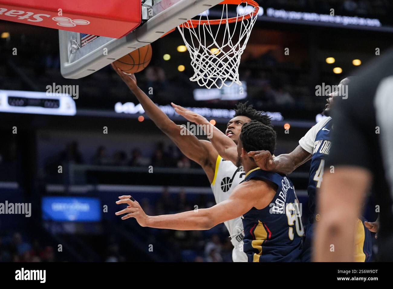 Utah Jazz guard Collin Sexton goes to the basket against New Orleans ...