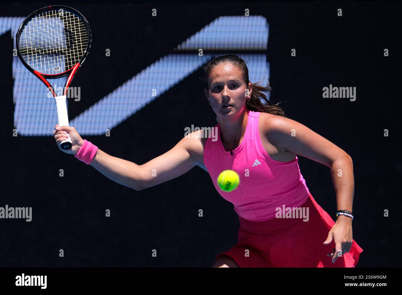 Daria Kasatkina of Russia plays a forehand return to Yulia Putintseva ...