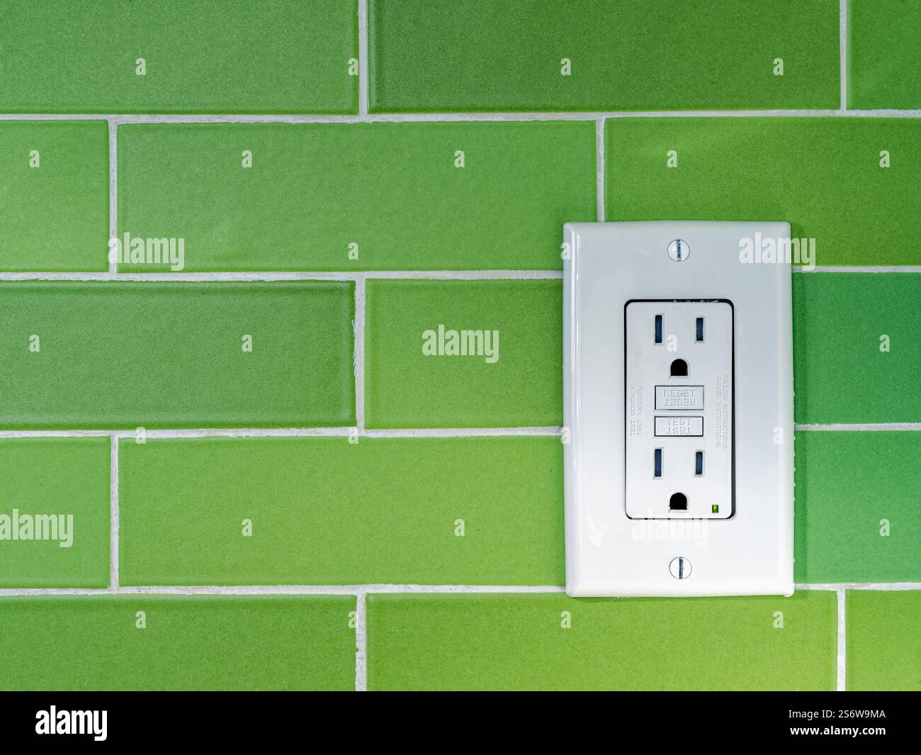 A GFCI (Ground Fault Circuit Interrupter) electrical outlet installed ...