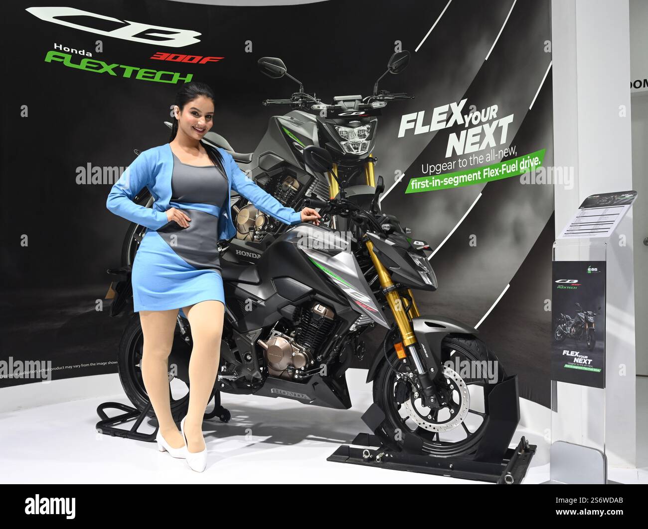 New Delhi, India. 17th Jan, 2025. NEW DELHI, INDIA - JANUARY 17: Model with Honda QC E Bike and ...