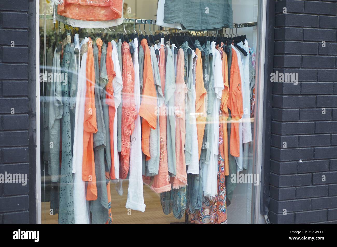 A Vibrant and Colorful Clothing Display in the Storefront Window of a ...