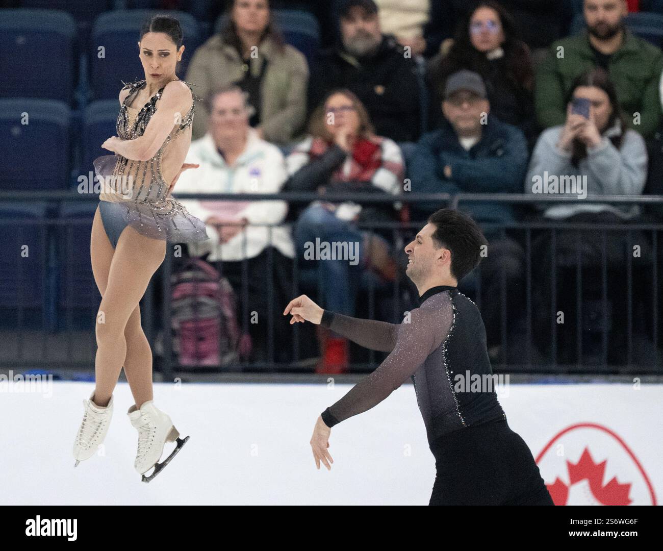 Deanna Stellato-Dudek and Maxime Deschamps perform their short program ...