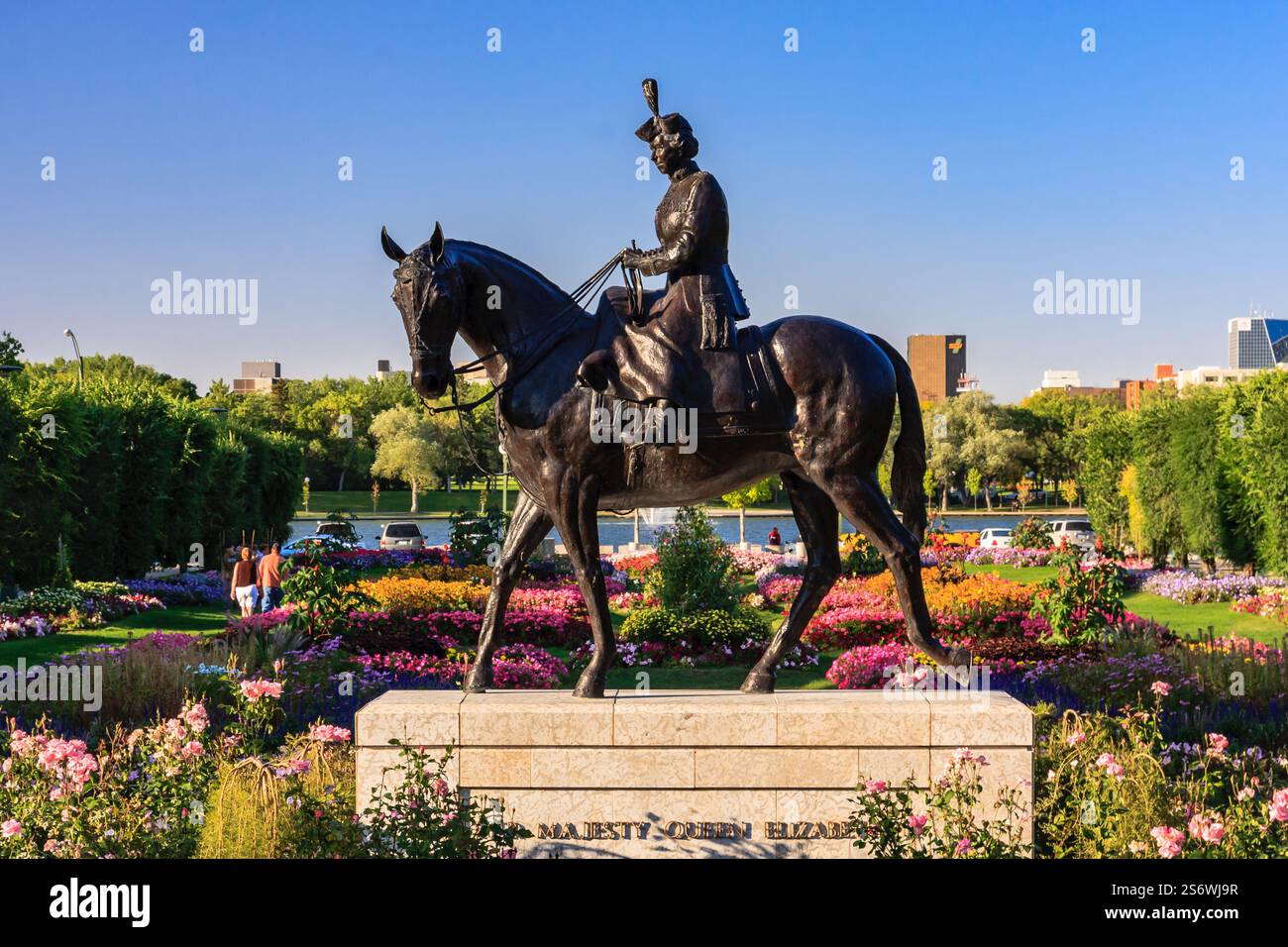 A statue of a woman riding a horse with the name Queen Elizabeth II on ...