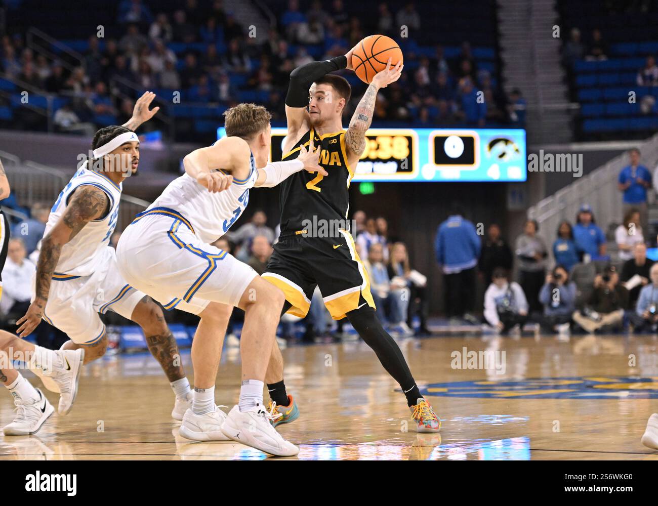 LOS ANGELES, CA - JANUARY 17: Iowa Hawkeyes guard Brock Harding (2) try ...