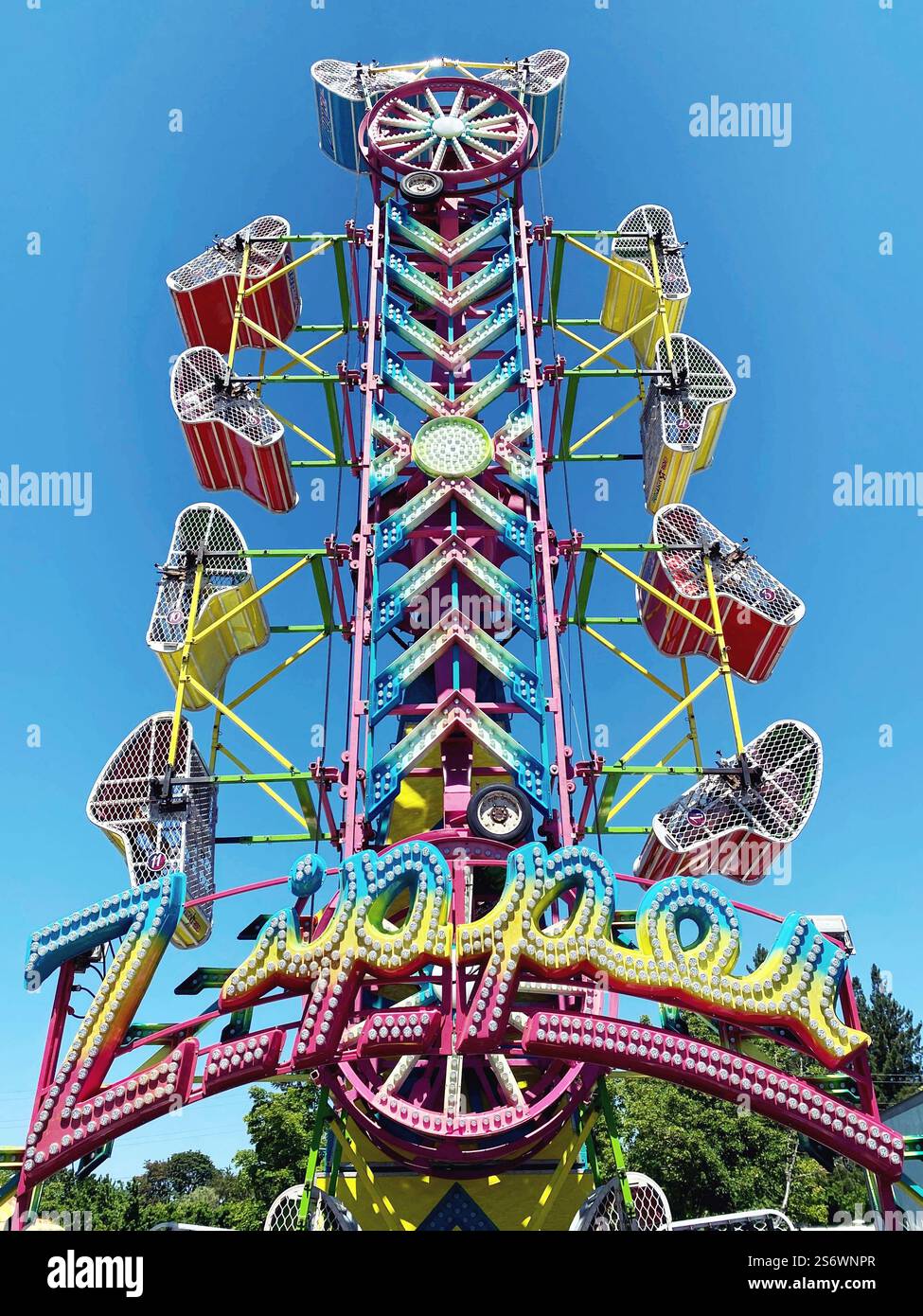 The Zipper carnival ride on a clear sunny day Stock Photo - Alamy