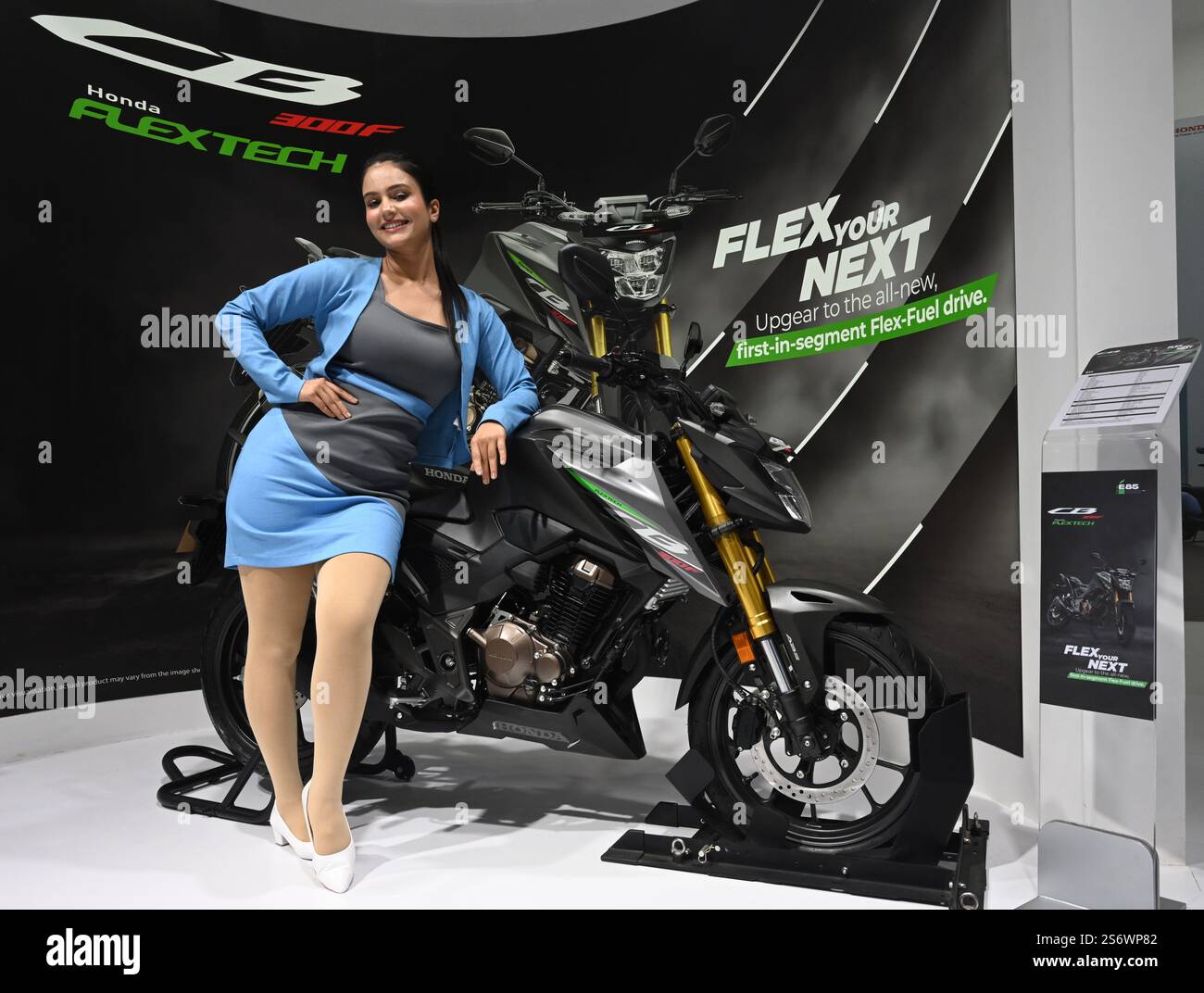 New Delhi, India. 17th Jan, 2025. NEW DELHI, INDIA - JANUARY 17: Model with Honda QC E Bike and ...