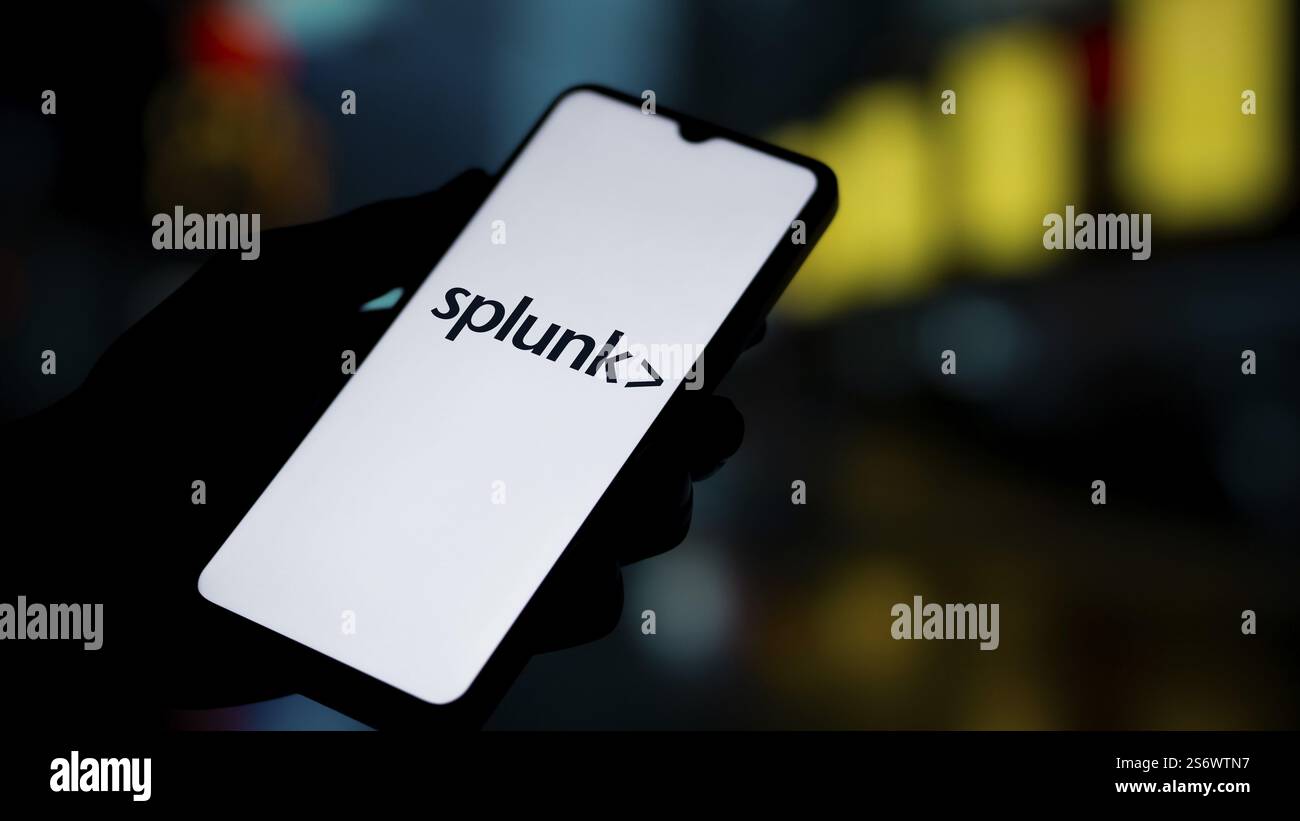 splunk logo is displayed on smartphone. Splunk Inc. is an American ...