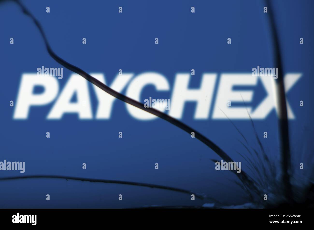 Paychex logo is visible on the broken glass Stock Photo - Alamy