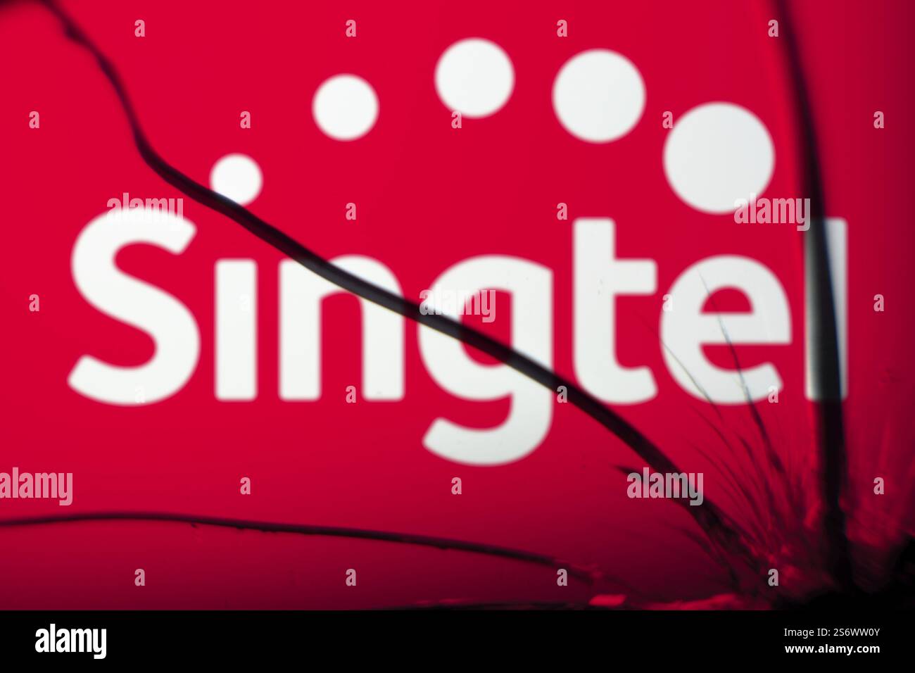 Singtel logo is visible on the broken glass. Singtel is a Singaporean ...