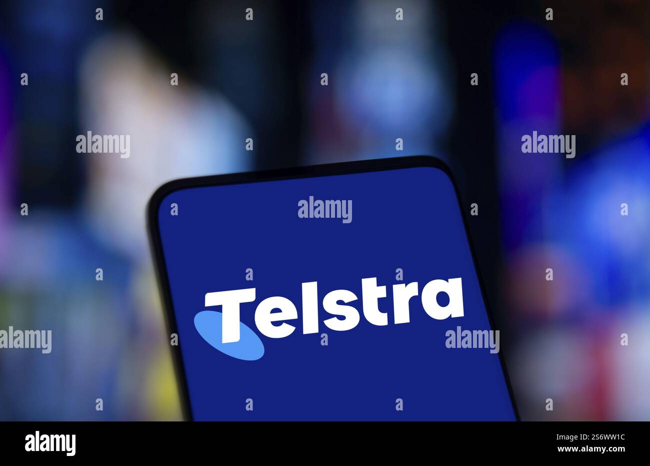 Telstra logo is displayed on smartphone. Telstra Group Limited is an ...