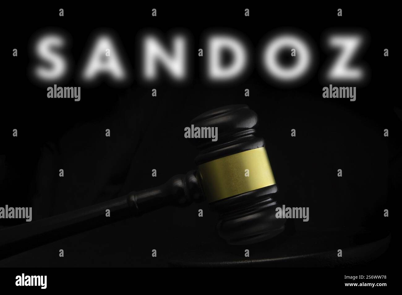Court gavel in front of the Sandoz logo. Sandoz Group AG is a Swiss ...
