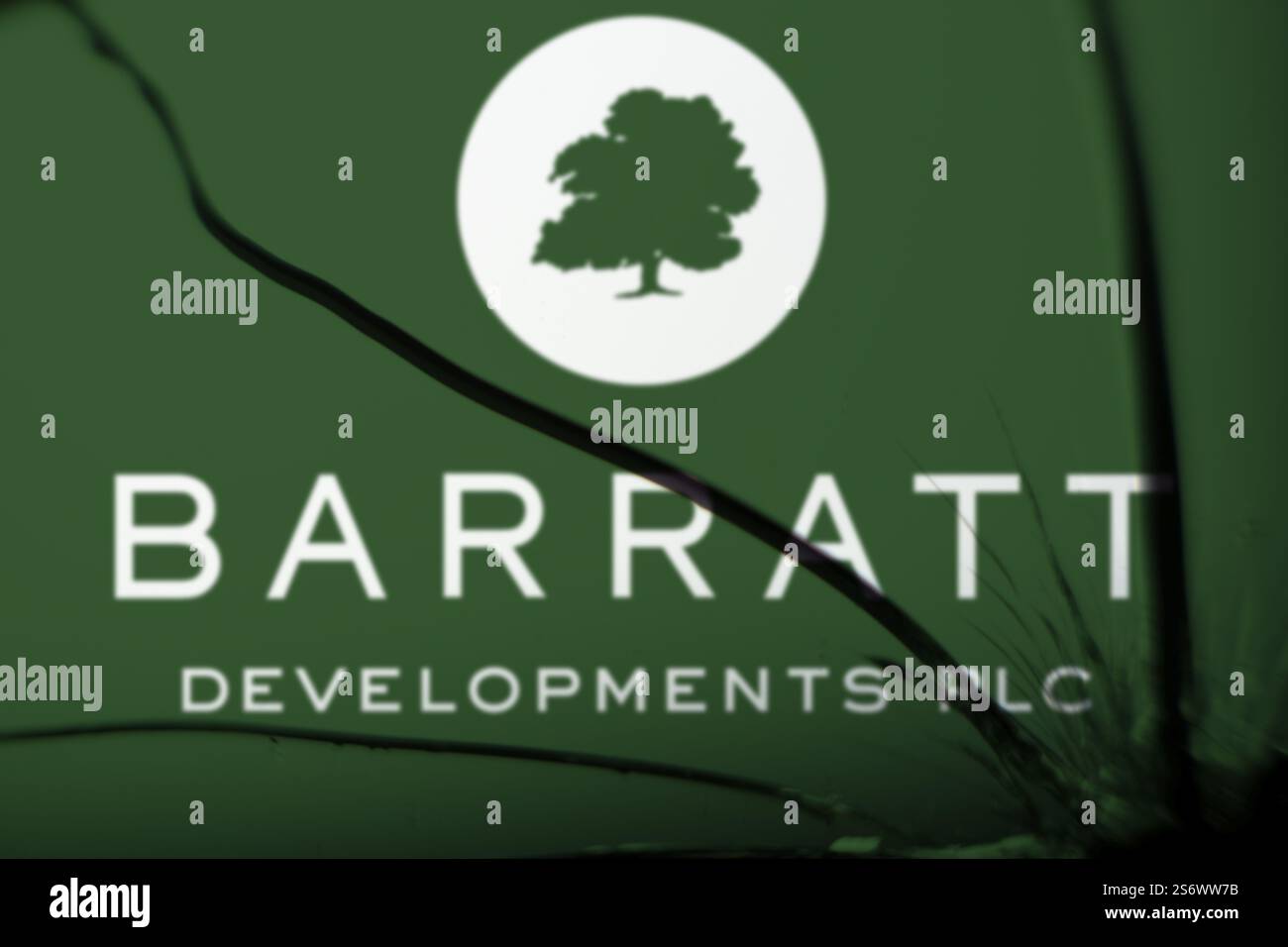 Barratt Developments plc logo is visible on the broken glass Stock ...