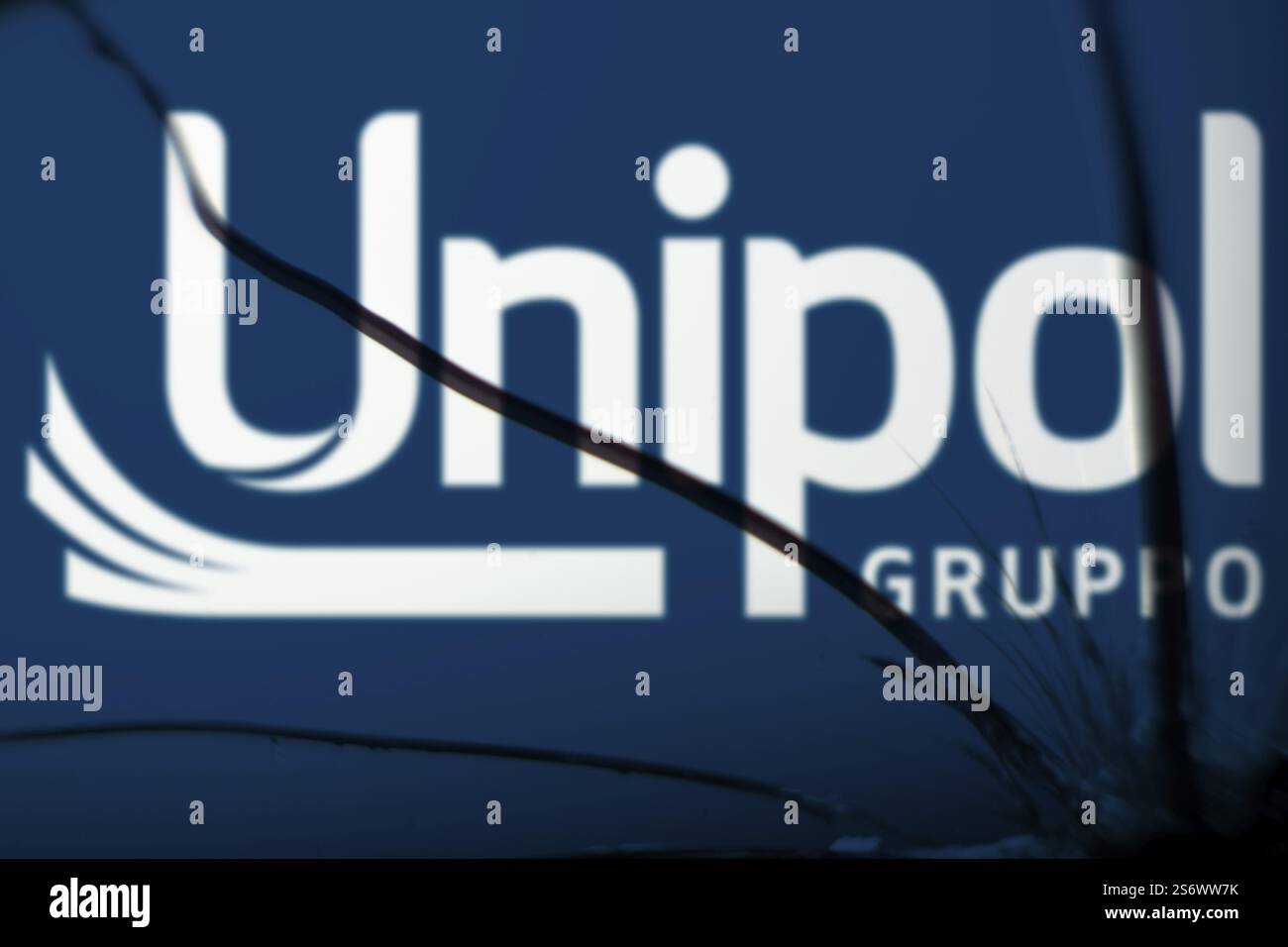 Unipol gruppo logo is visible on the broken glass. Unipol Gruppo S.p.A ...