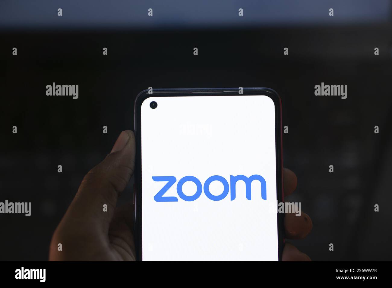 Zoom Workplace logo is displayed on smartphone Stock Photo - Alamy