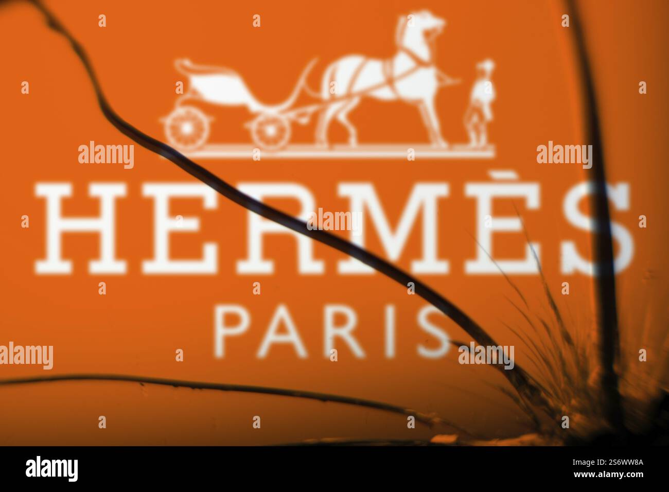 Hermes Paris logo is visible on the broken glass. Hermes International ...