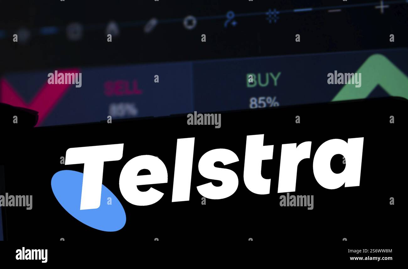 Telstra logo is displayed on smartphone. Telstra Group Limited is an Australian ...