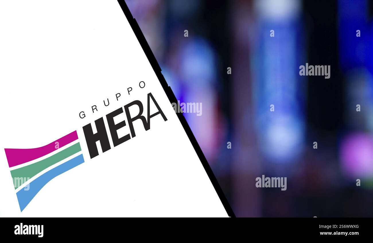 Gruppo hera log is displayed on smartphone. Hera spa is a multiutility ...