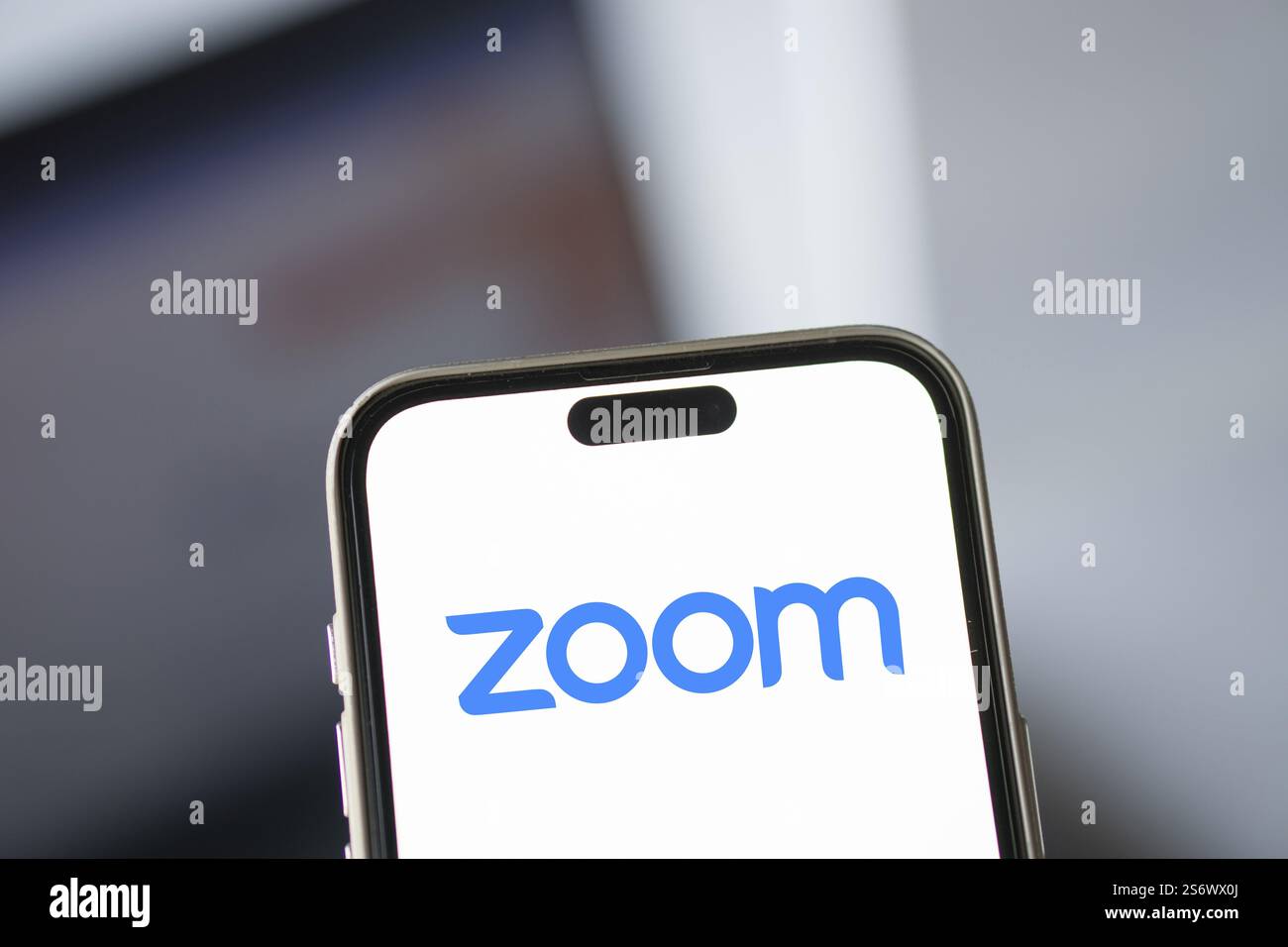 Zoom Workplace logo is displayed on smartphone Stock Photo - Alamy