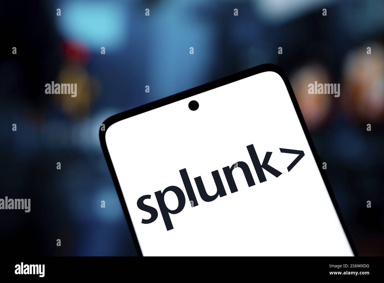 splunk logo is displayed on smartphone. Splunk Inc. is an American ...