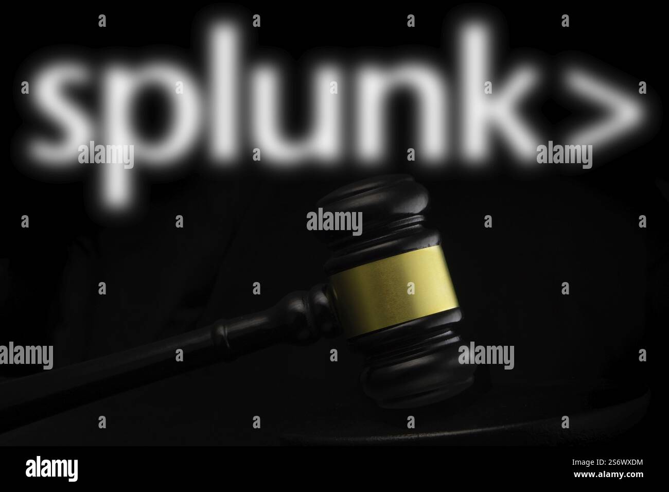 Court gavel in front of the splunk logo. Splunk Inc. is an American ...