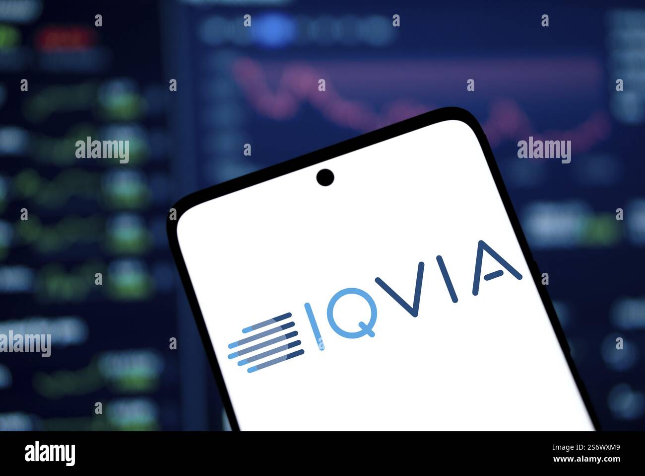 IQVIA logo is displayed on smartphone. IQVIA is an American ...