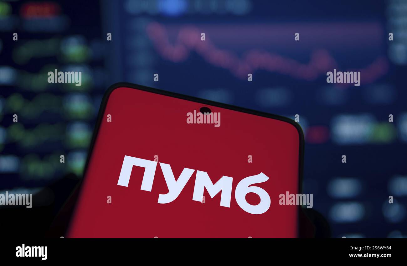 First Ukrainian International Bank logo is displayed on smartphone ...