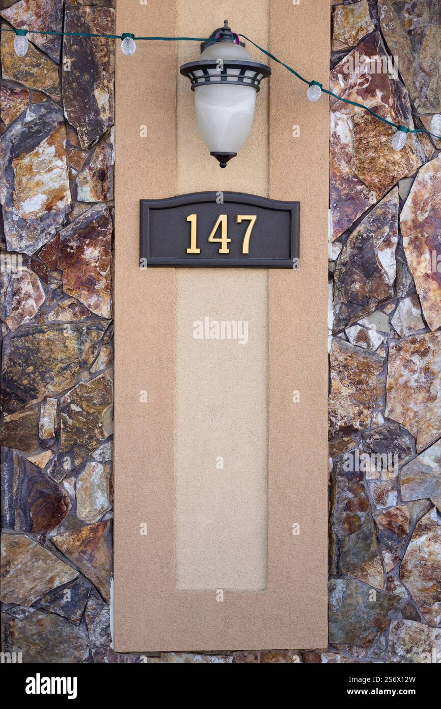 house number under house street light Stock Photo - Alamy