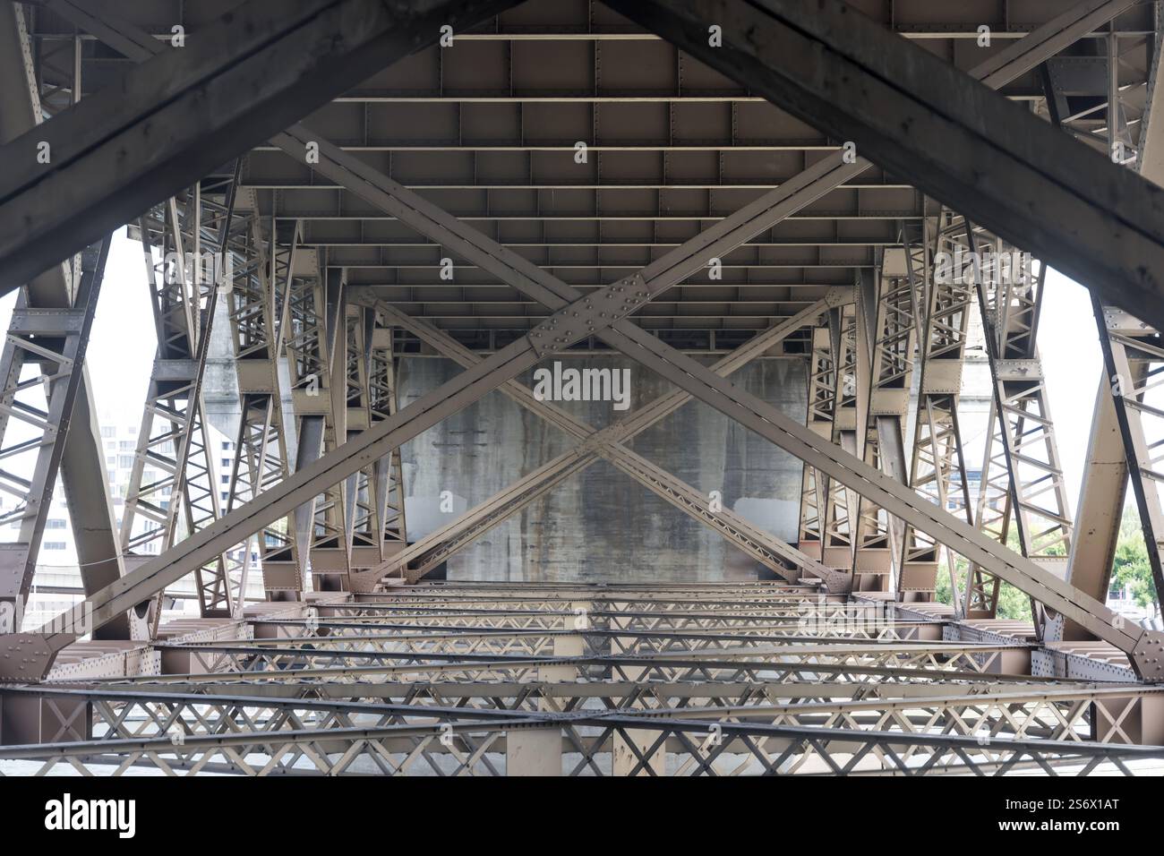 Underneath white metal structure of Burnside Bridge in Portland Oregon ...