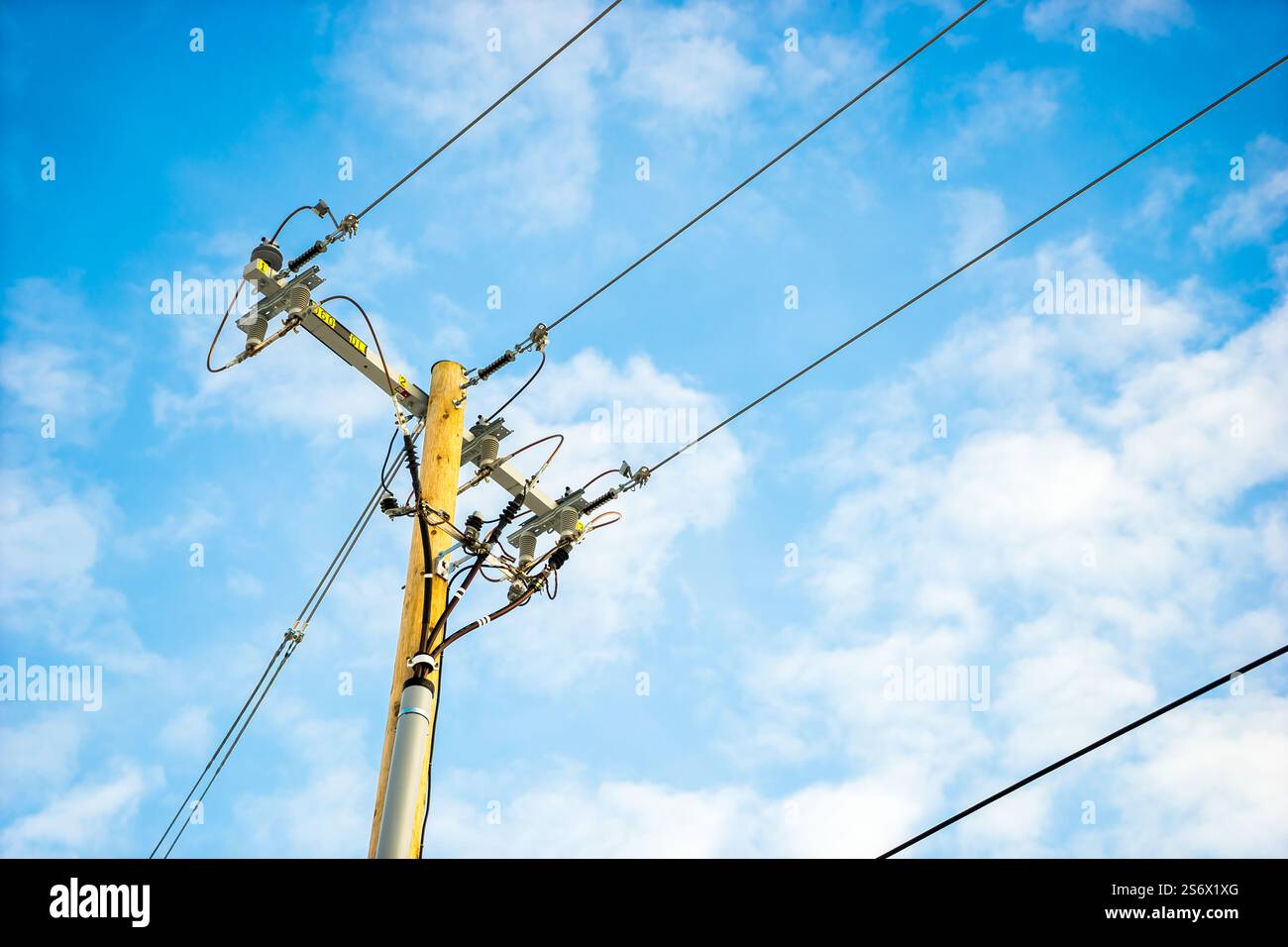 Point wher air power lines go underground Stock Photo - Alamy