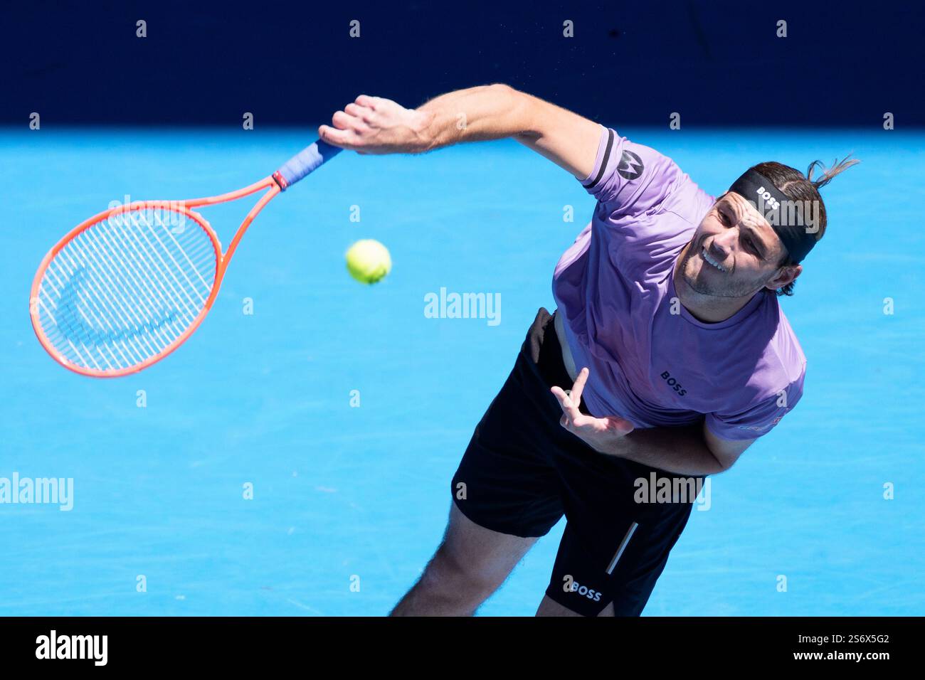 Melbourne, Australia. 18th Jan, 2025. 4th seed TAYLOR FRITZ of the USA in action against GAEL ...