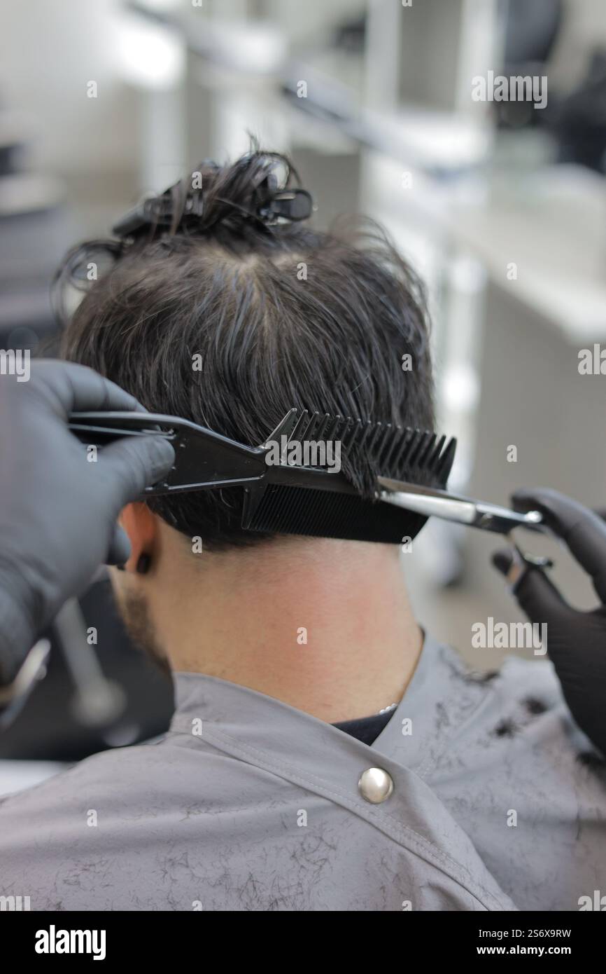 person having a haircut in a hairdresser's salon Stock Photo - Alamy