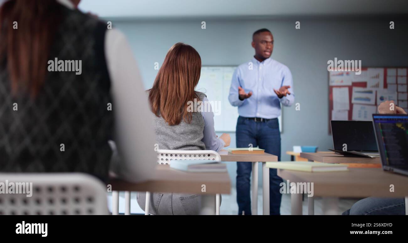 Teacher In Classroom Lesson. High School Education Stock Photo - Alamy