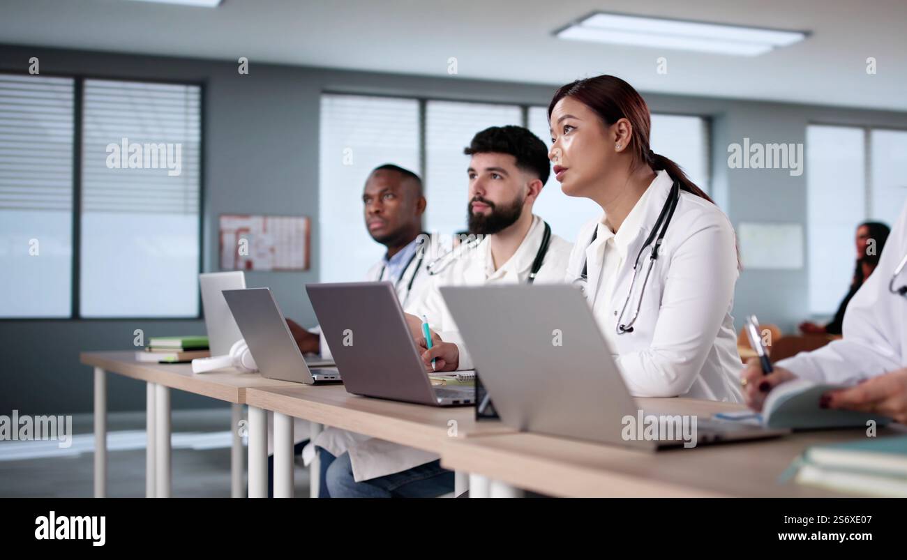 Medical University Students Listening To Professor Doctor In Classroom ...
