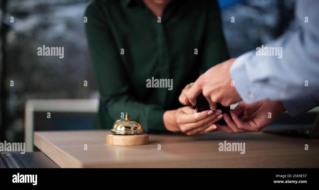 Hotel Reception. Hospitality Experience. Guest Touching Bell Stock ...