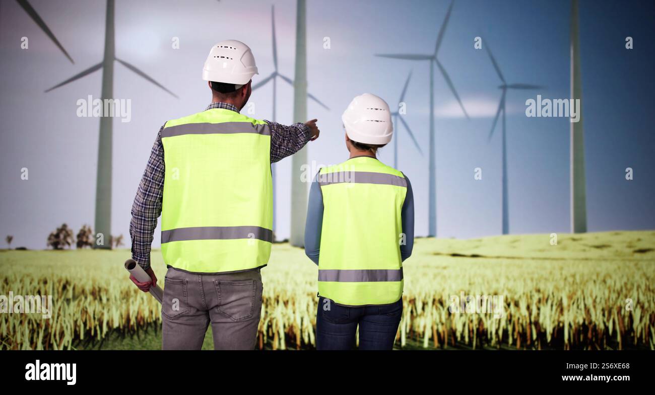 Wind Turbine Engineers At Sustainable Green Energy Farm Stock Photo - Alamy