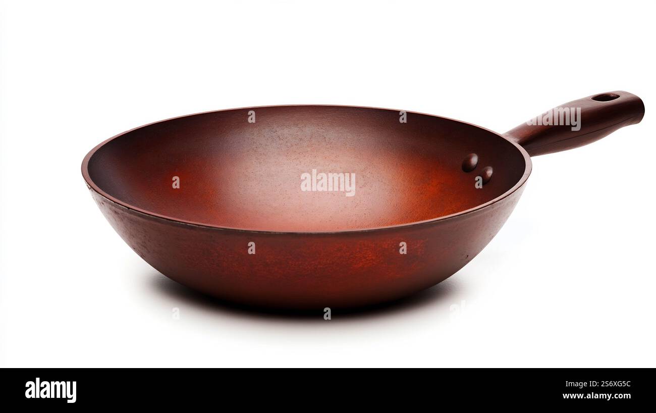 Closeup of a traditional brown metallic Asian cooking wok pan isolated ...