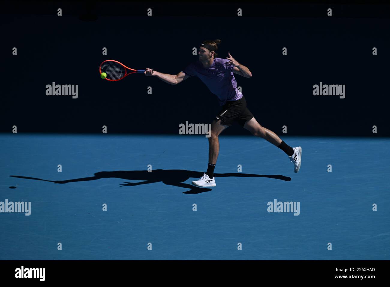 Melbourne, Australia. 18th Jan, 2025. Taylor Fritz of USA returns during his round three match ...