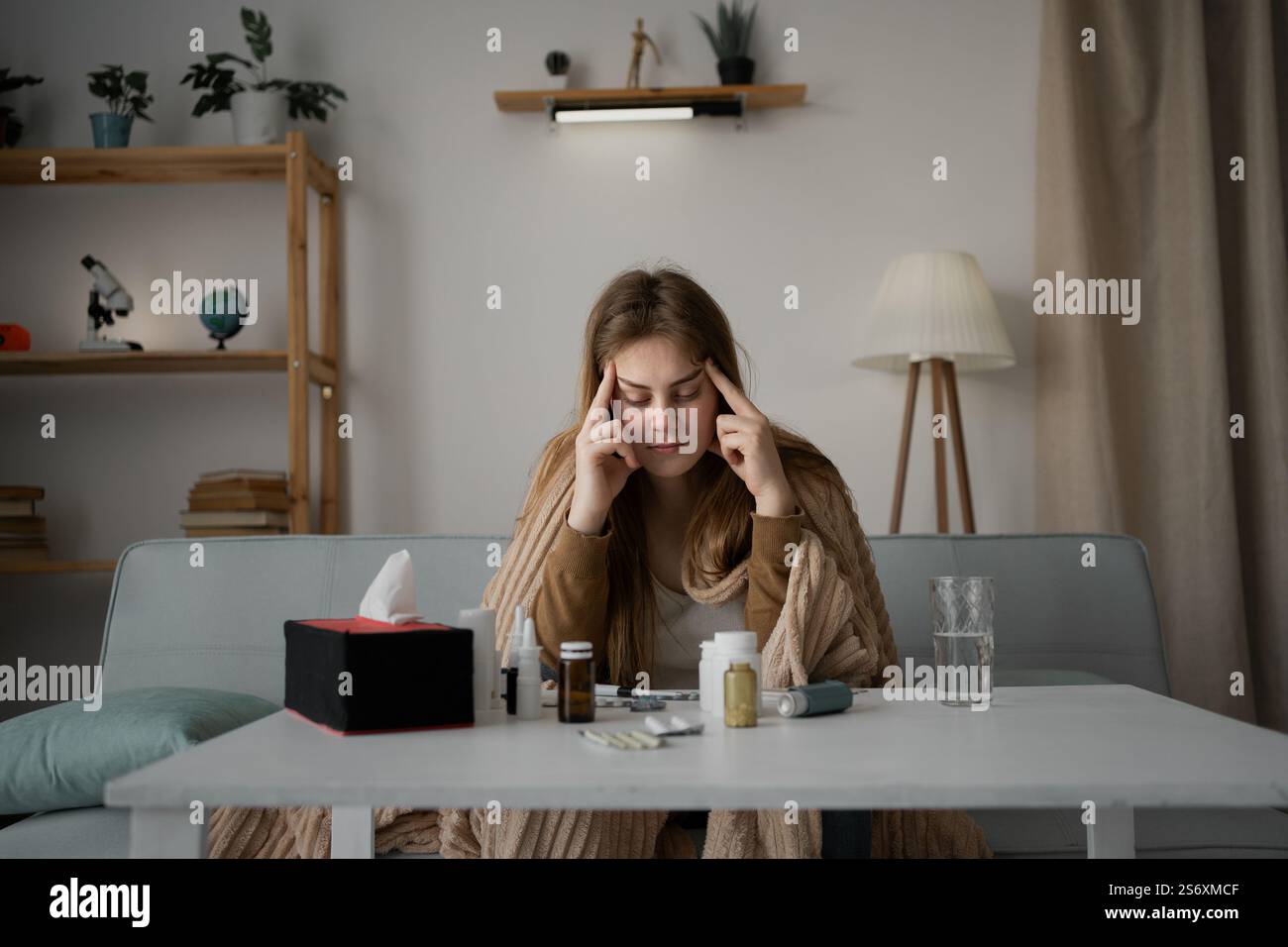 Sick, influenza, headache and fever. Woman holding head with hands have ...