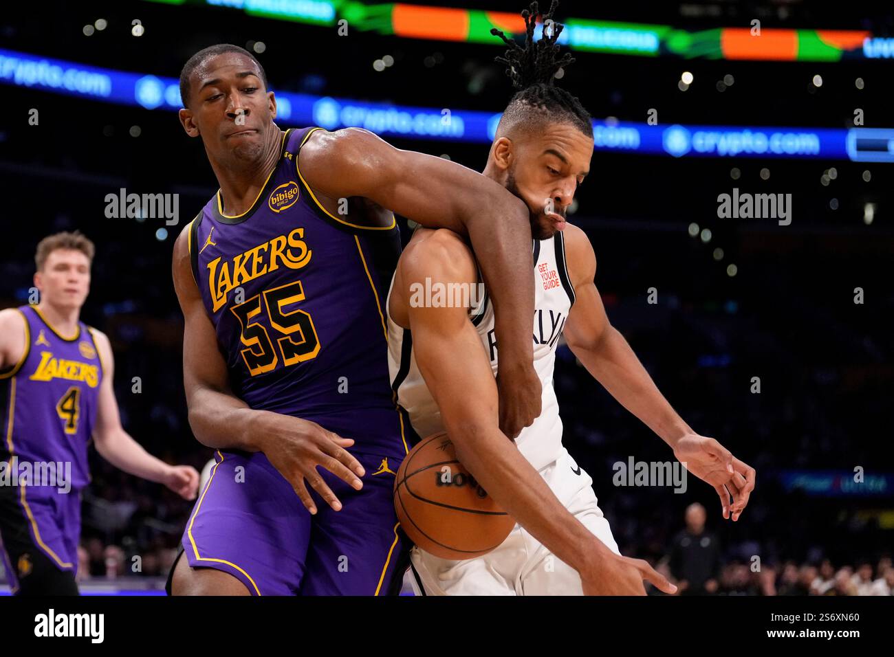 Los Angeles Lakers center Trey Jemison III, center, and Brooklyn Nets ...