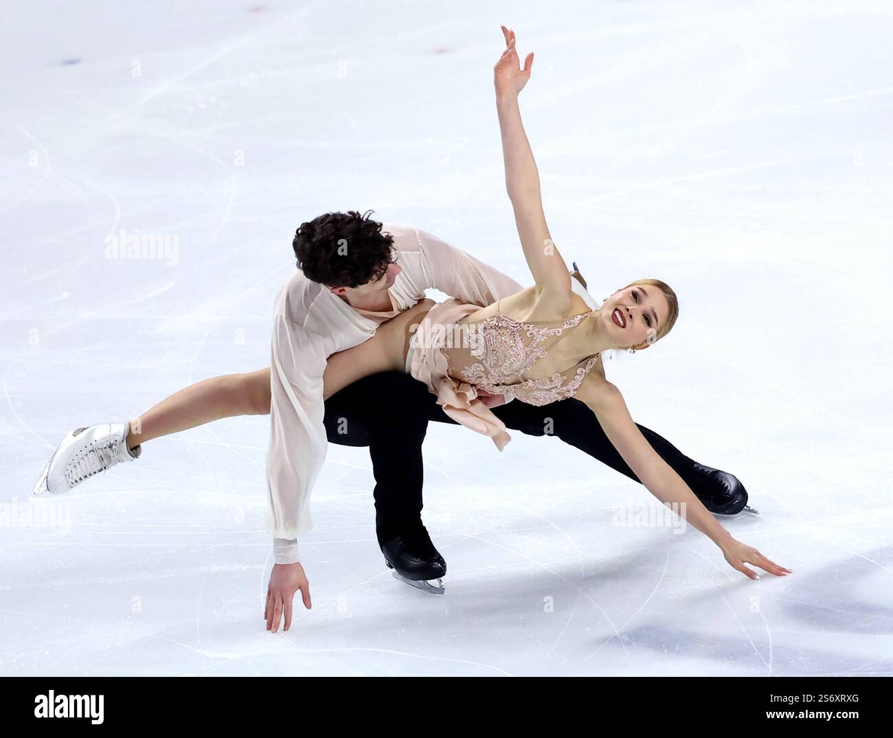 Turin, Italy. 17th Jan, 2025. Sofia Val (R)/Asaf Kazimov of Spain ...