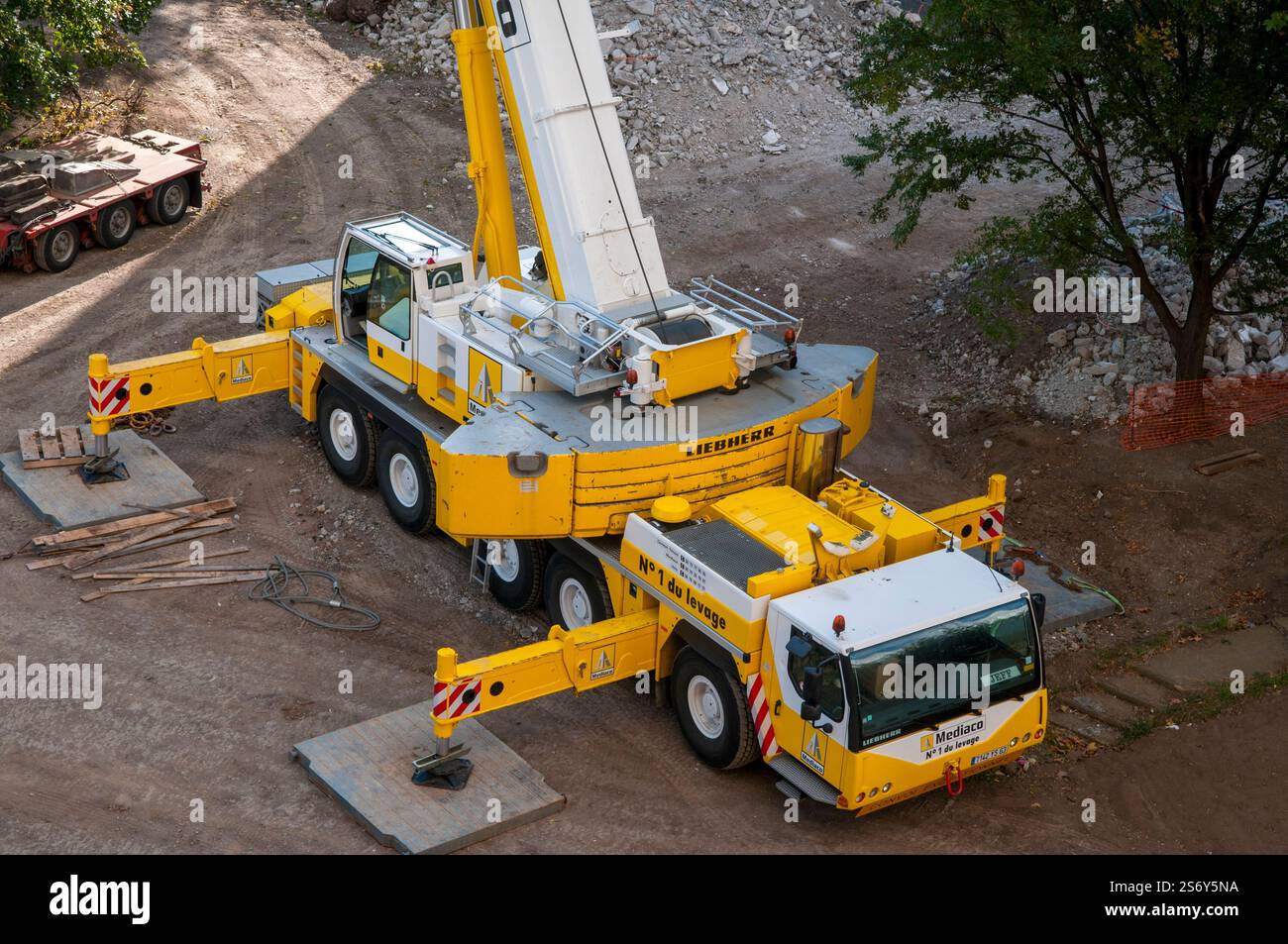 Assembly of counterweights on a liebherr mobile crane Stock Photo - Alamy