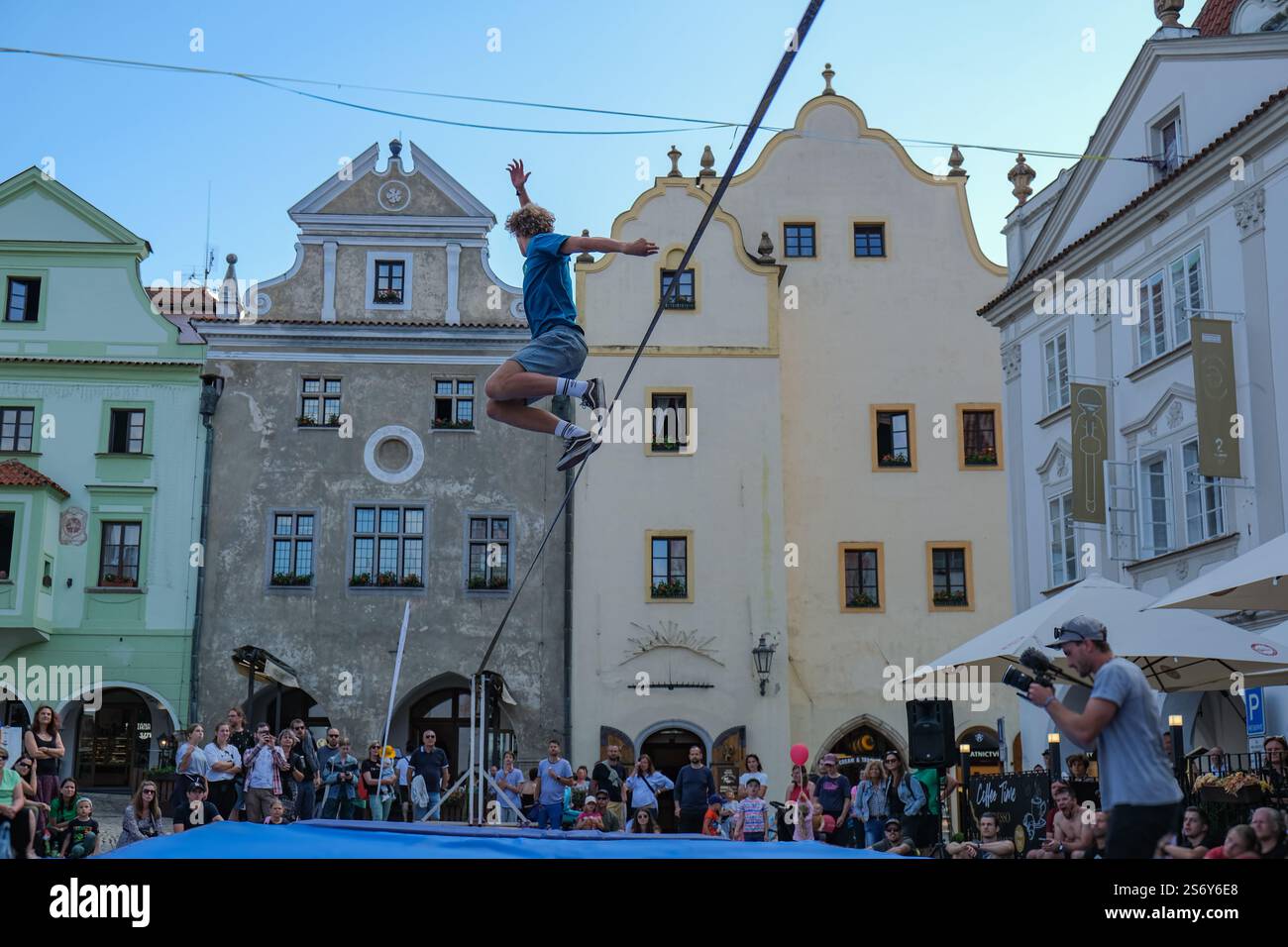 Slackliner Performing in Historic Town Square Stock Photo - Alamy