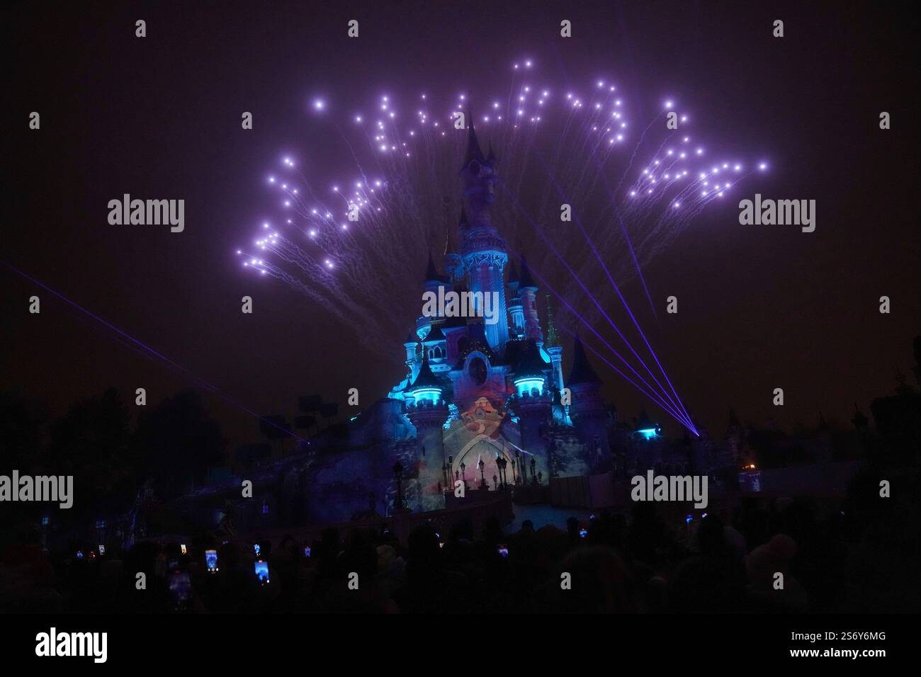 A light show is projected on the castle of Sleeping Beauty as fireworks ...