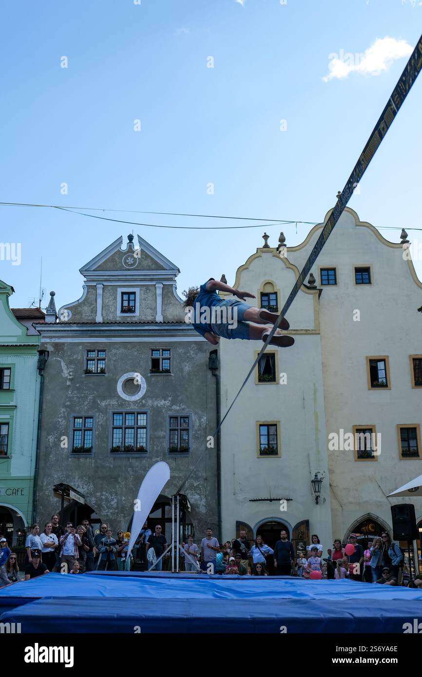 Slackliner Performing in Historic Town Square Stock Photo - Alamy