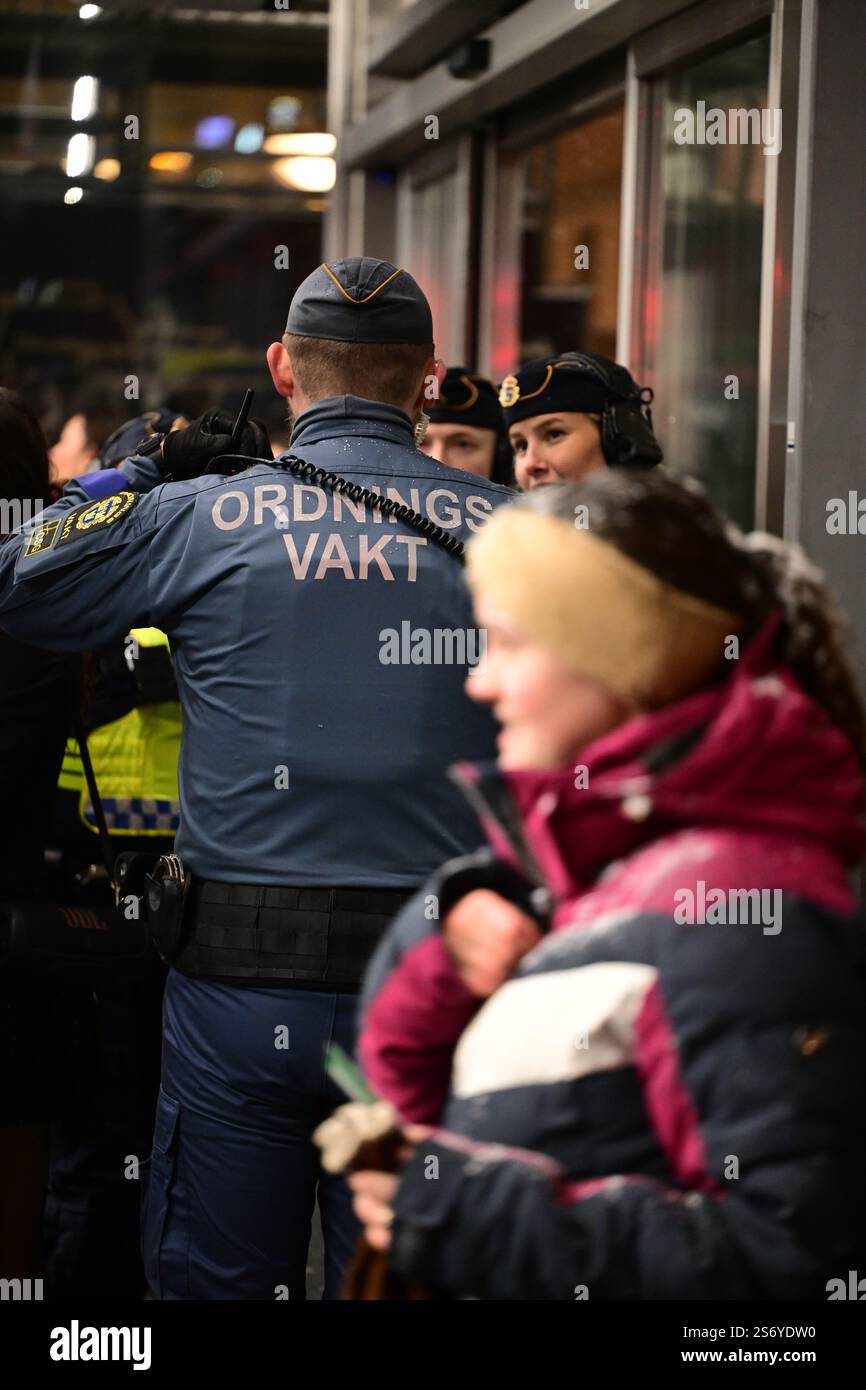 Stockholm, Uppland, Sweden. January 1 2025. Police and security guards ...