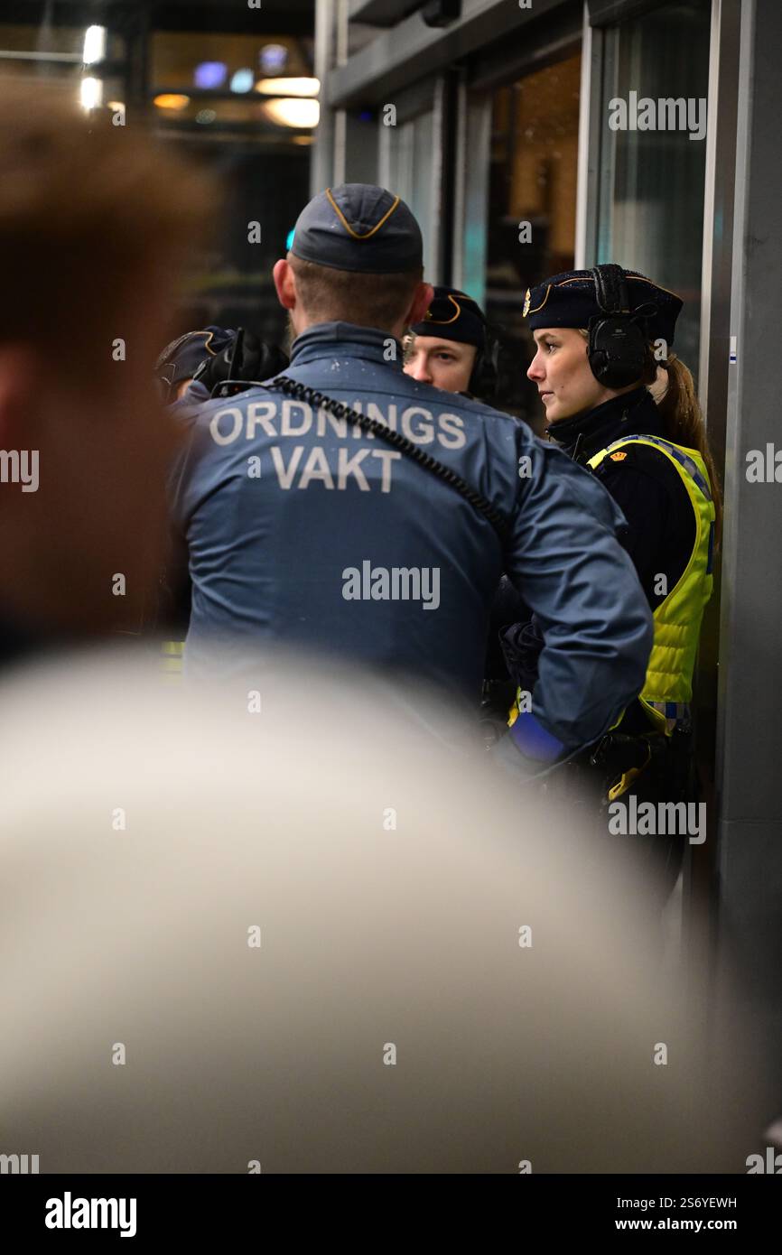Stockholm, Uppland, Sweden. January 1 2025. Police and security guards ...