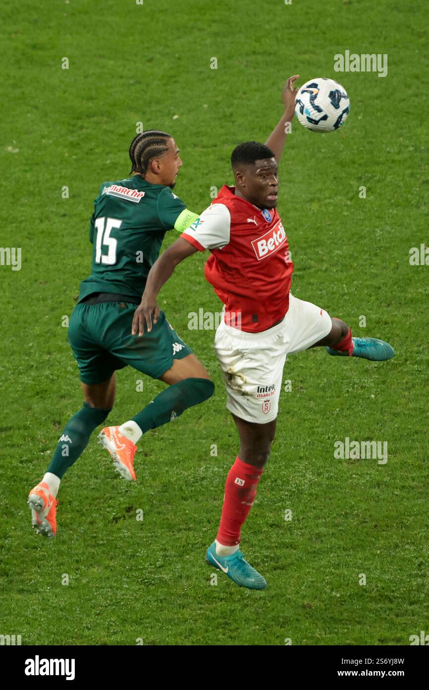 Reims, France. 14th Jan, 2025. Thilo Kehrer of Monaco, Marshall Munetsi ...