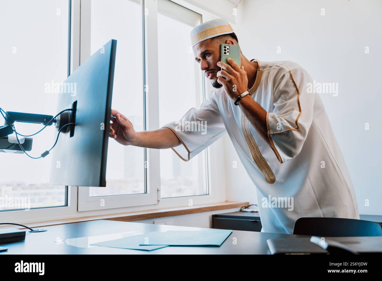 Moroccan Business man in the office. Young business man with ...
